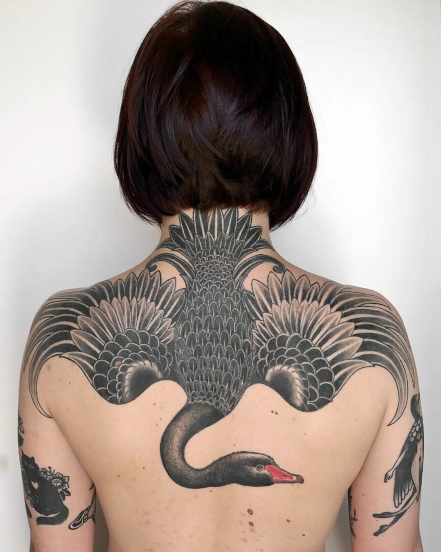 20 Captivating Swan Tattoos For A Graceful Appearance