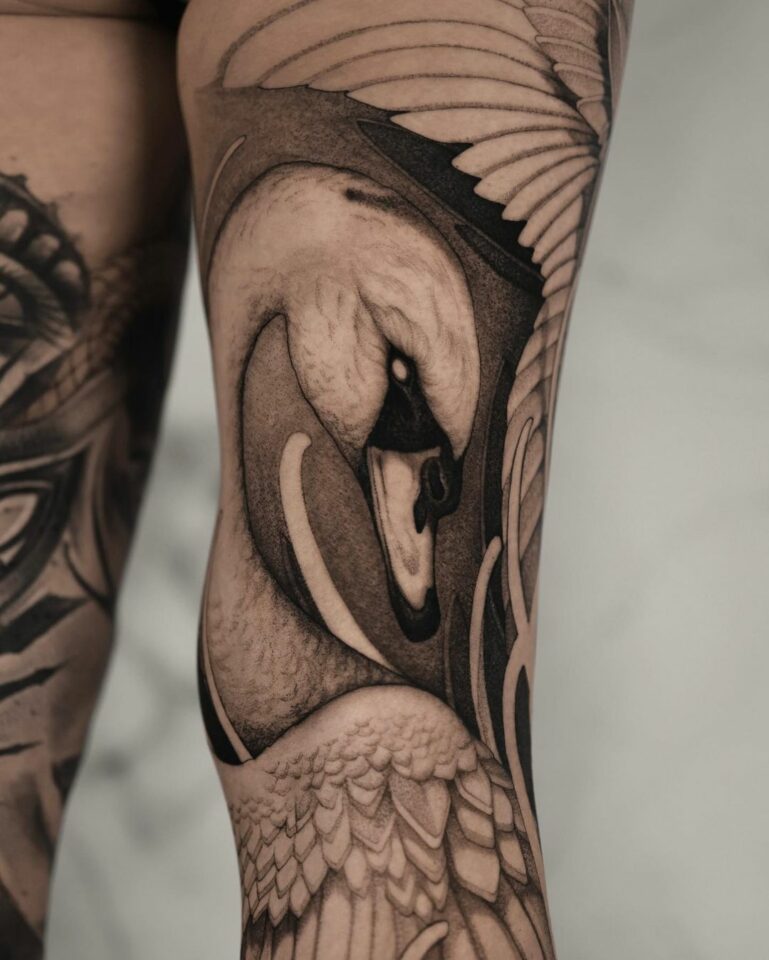 20 Captivating Swan Tattoos For A Graceful Appearance