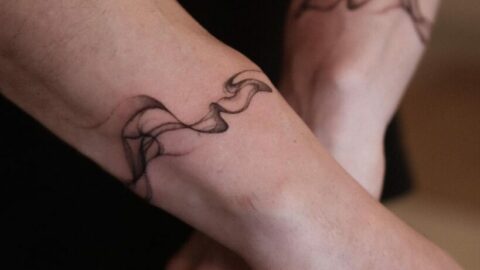 21 Satisfying Smoke Tattoos That'll Light Up Your Day