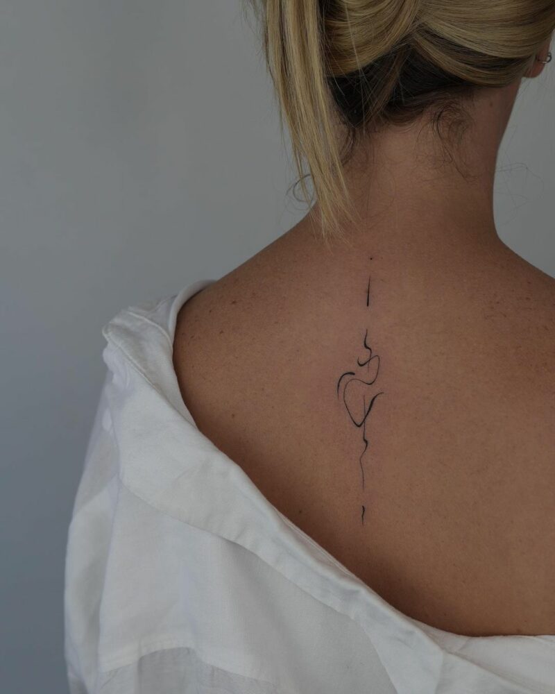 23 Dainty Back Tattoos, From Delicate Dots To Daring Designs
