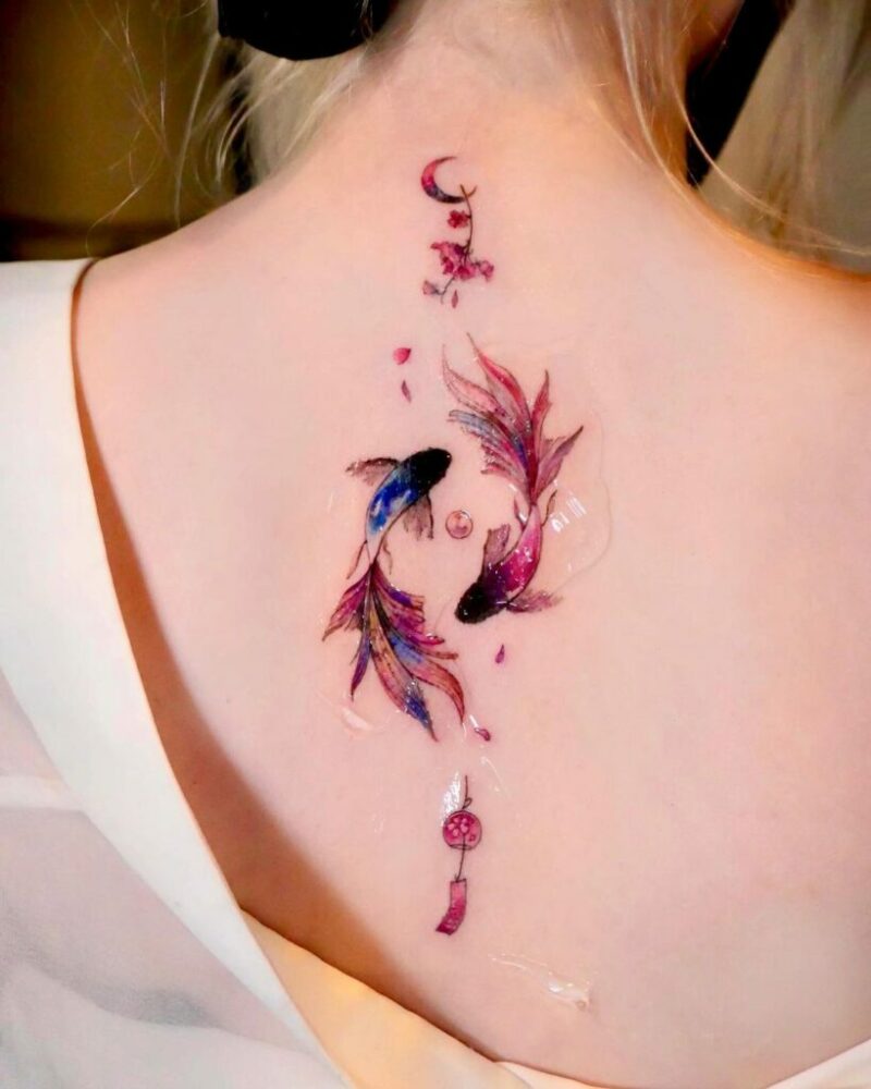 24 Cute Spine Tattoos That Are "Ink-credibly" Trendy