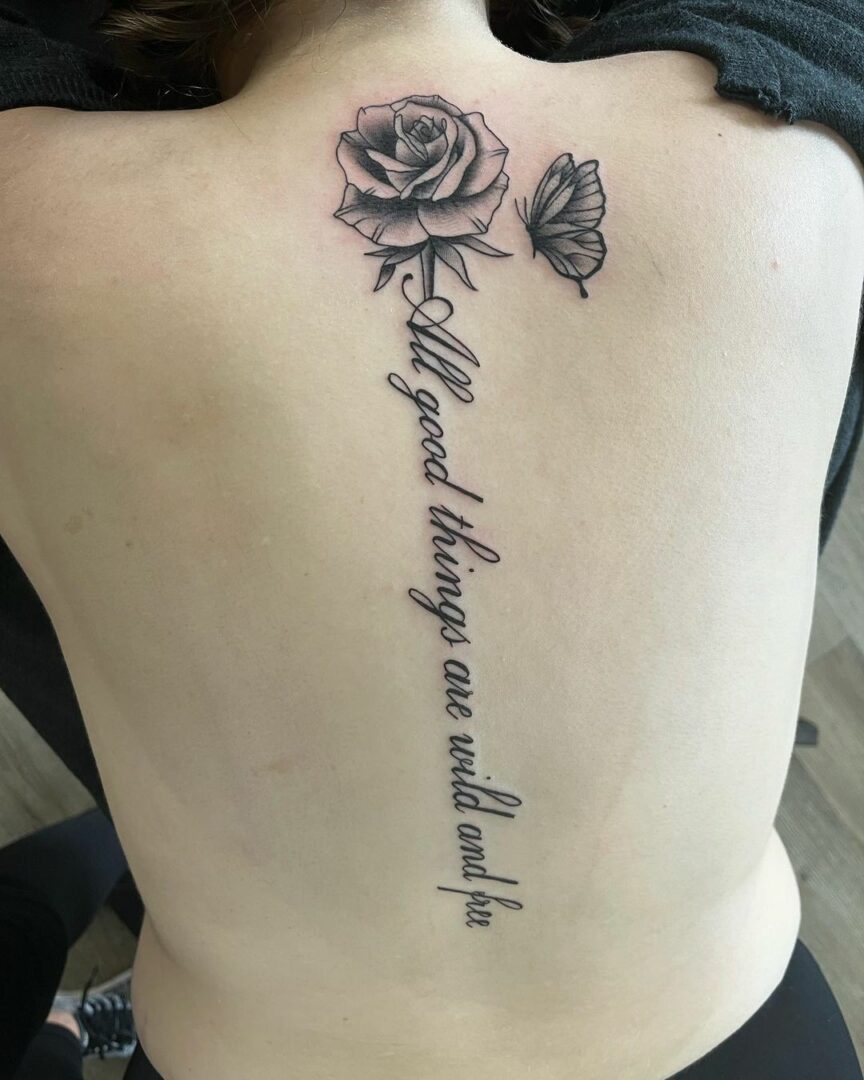 24 Cursive-Style Spine Tattoo Ideas From Delicate To Sassy