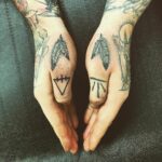20 Epic Feather On Finger Tattoo Ideas To Wear Like A Ring