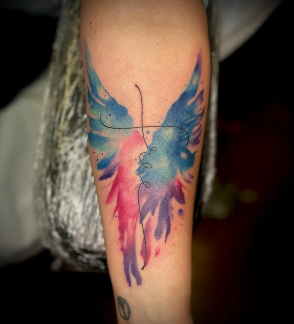 23 Beautiful Wing Tattoos To Soar Towards Your Freedom