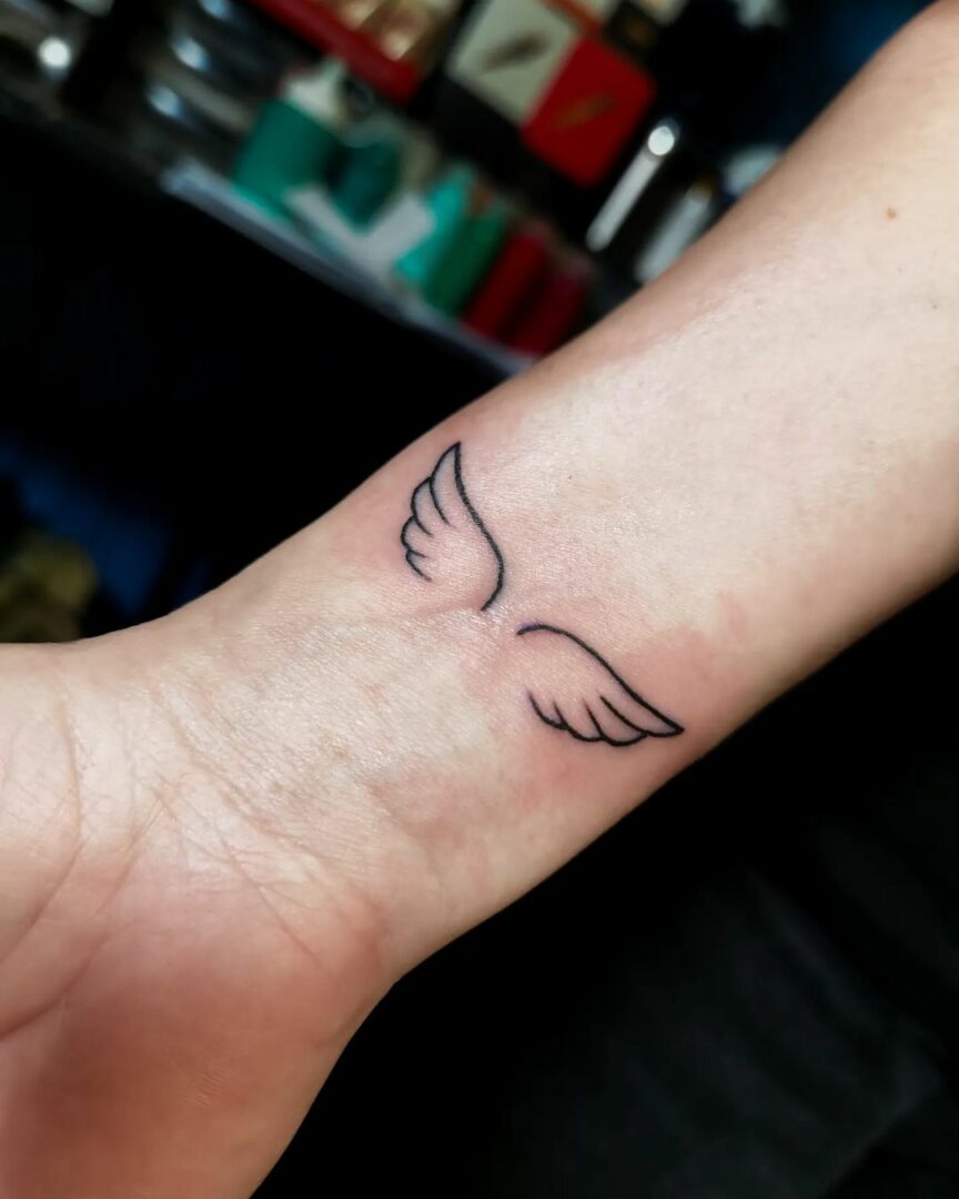23 Beautiful Wing Tattoos To Soar Towards Your Freedom