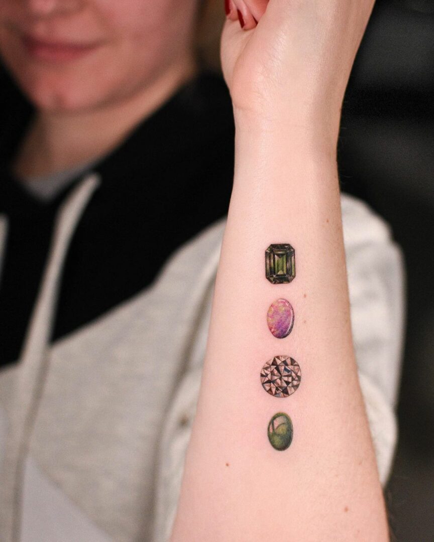 19 Enchanting Emerald Tattoo Ideas To Whisk You Away to Fantasy