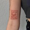 20 Lighthearted Stamp Tattoo Ideas For All The Dreamers Out There