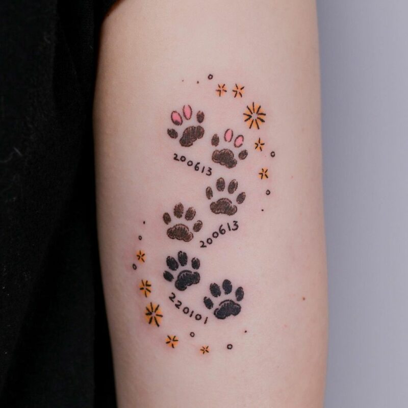 18 Charming Cat Paw Tattoos That Will Make You Say "Meow"